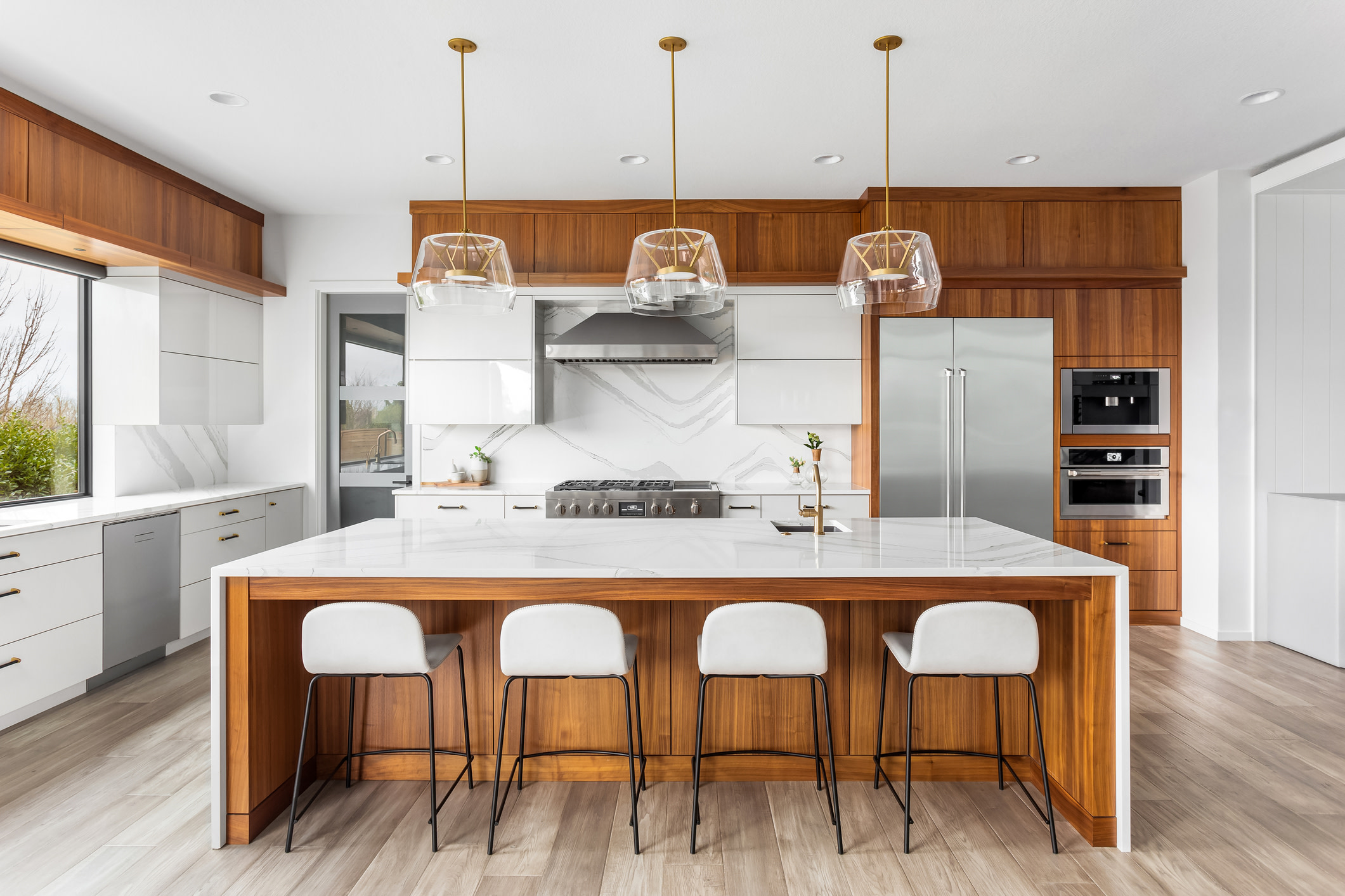 16 Ideas for Kitchen Islands With Seating, Designers Explain