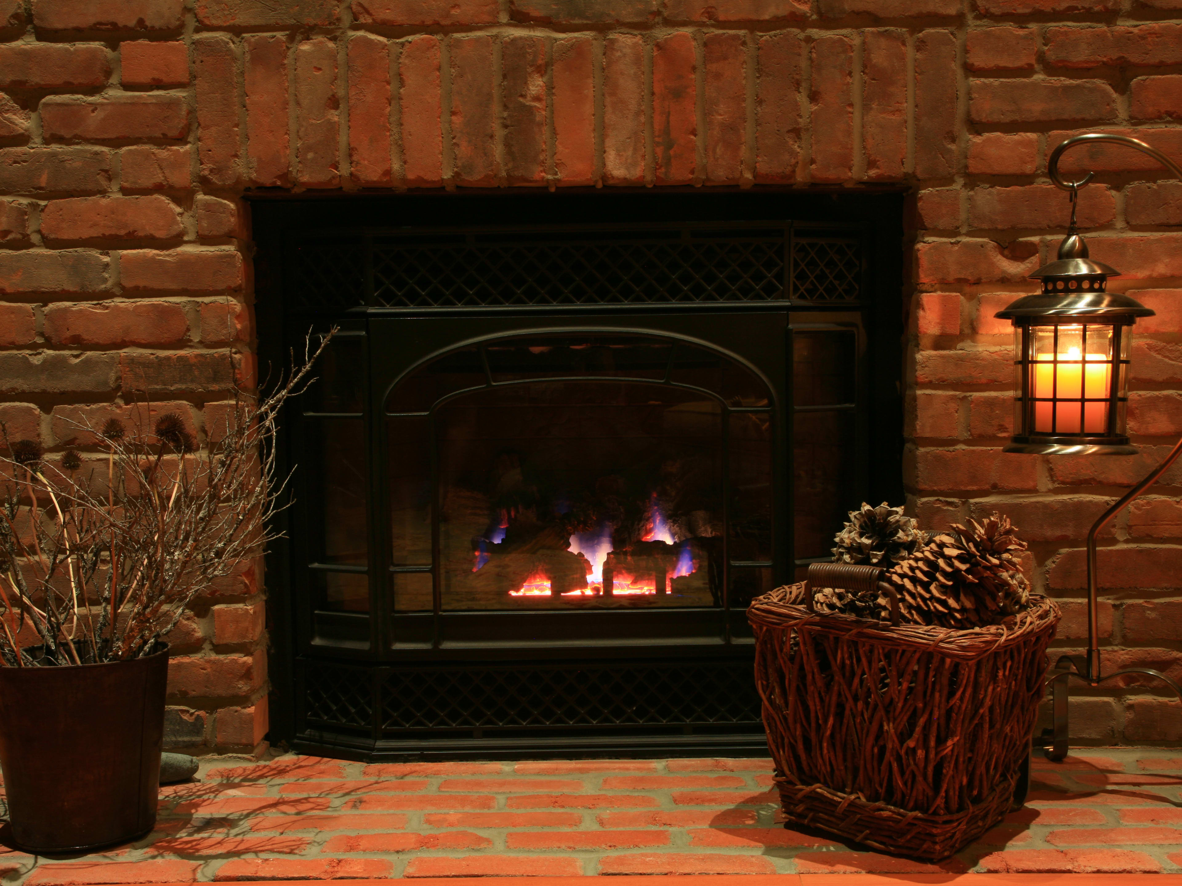 Woman Paints Old Red Brick Fireplace a 'Quirky' Color - Parade Home ...